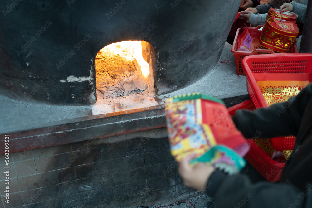 burn paper sacrificial offering. Text and symbol on the paper is the ...
