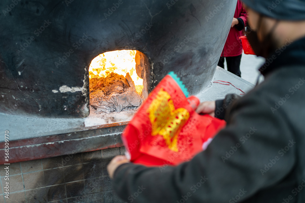 burn paper sacrificial offering. Text and symbol on the paper is the ...