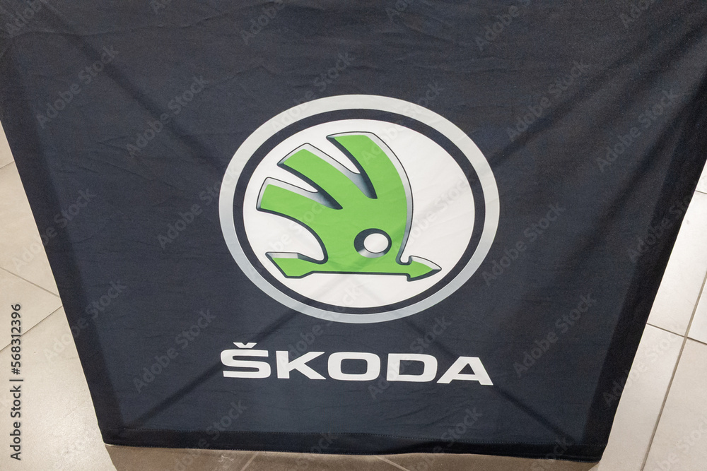 Skoda car dealership sign brand flag shop logo text in shop showroom ...