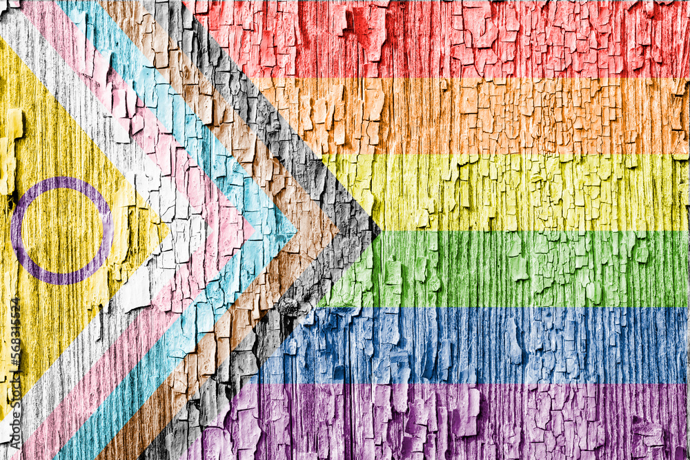 Progress LGBTQ rainbow flag waving in the wind at cloudy sky. Freedom ...