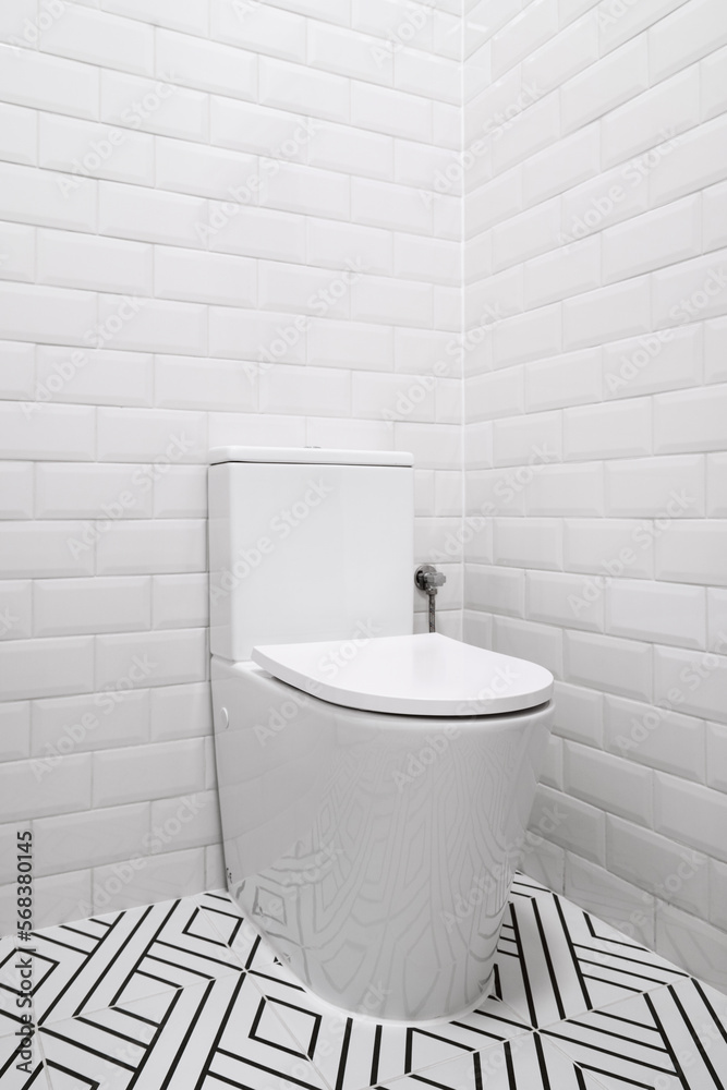 design of ceramic toilet in bathroom with white tile Stock Photo ...