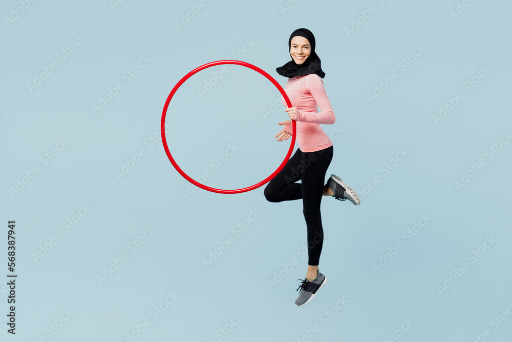 Full body young asian muslim fitness trainer sporty woman wear pink ...