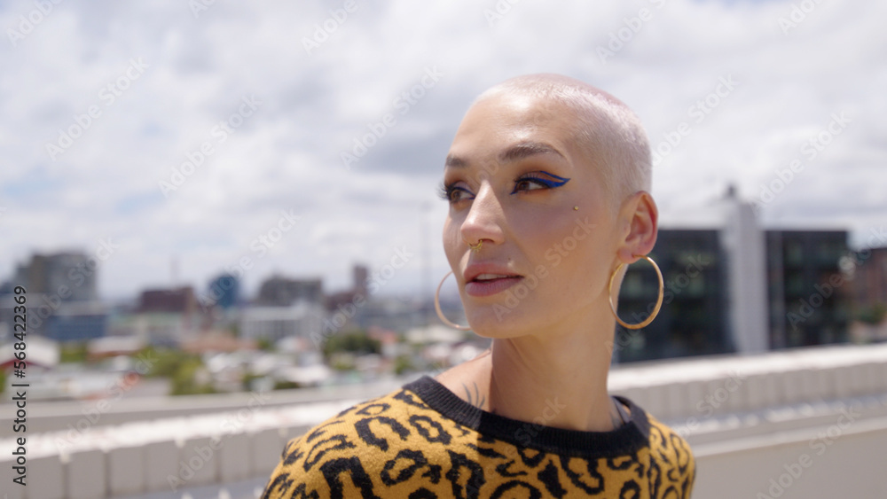 Beautiful woman smiling, wearing leopard print clothing on a city ...