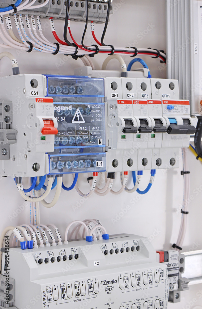 Electric switch with red handle for switching electrical circuits in ...