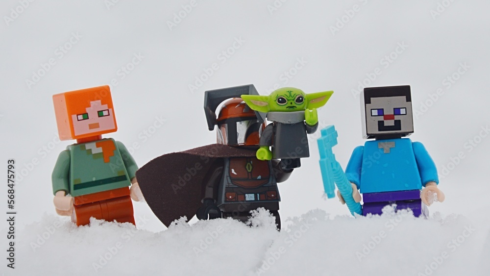 LEGO figures of Minecraft Steve and Alex standing next to LEGO Star ...