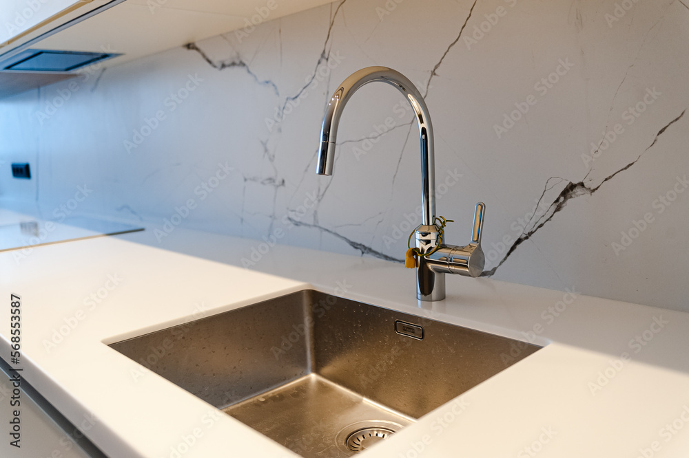 kitchen sink with faucet Stock Photo | Adobe Stock