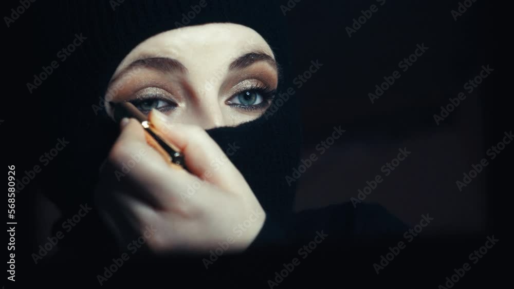 Portrait of a beautiful young Muslim woman in a hijab and with facial ...