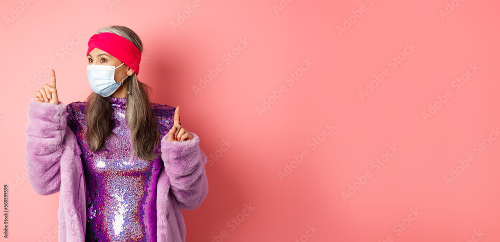 Covid-19, social distancing and fashion concept. Fancy asian senior ...