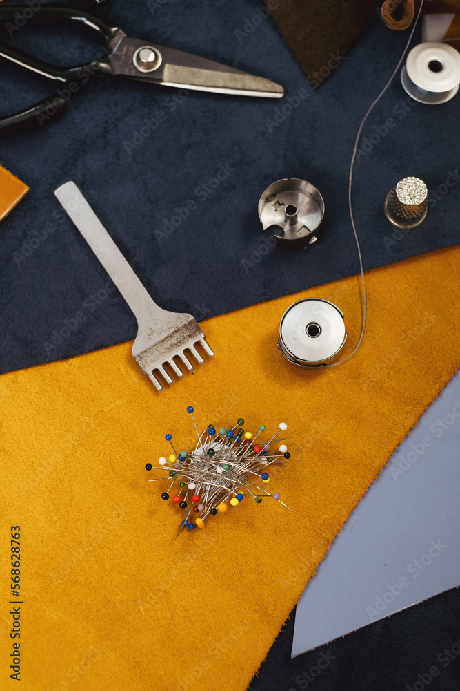 Tailor workplace accessories. Close up view of the eco leather and ...