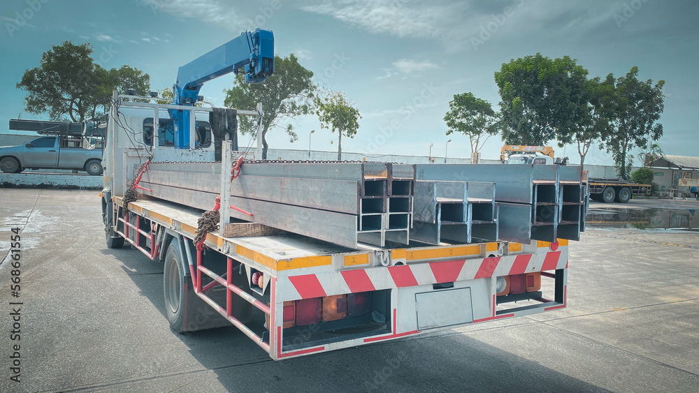 Steel beams production. Metal girders stack on project construction ...