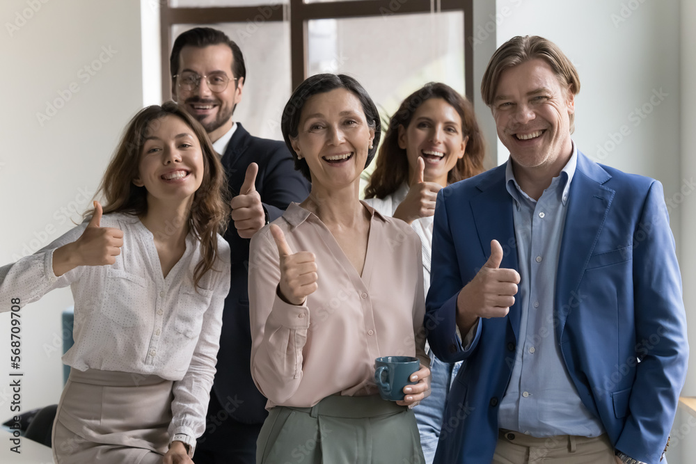 Happy successful diverse business team celebrating achieve, good ...