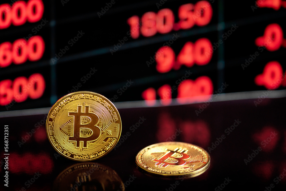 Gold coin cryptocurrency at computer trading chart background Stock ...