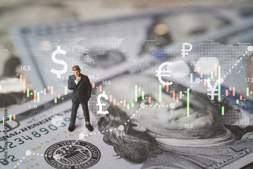 Foto de Businessman miniature figure standing on USD banknote with ...