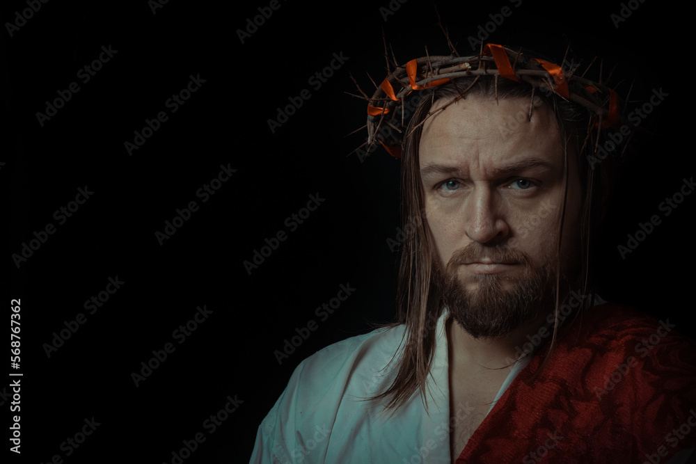 Jesus Christ wearing a crown of thorns and white chiton toga mantle ...