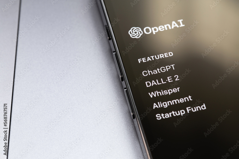 OpenAI website on the screen smatrphone closeup. OpenAI is an American ...