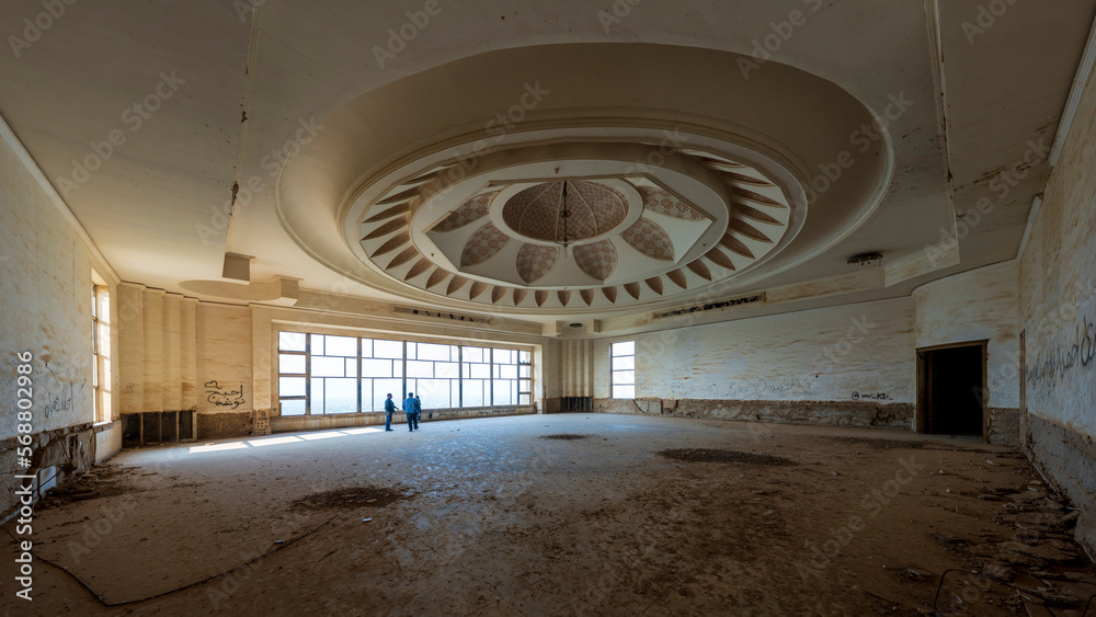 Saddam Hussein Palace in Babylon, Iraq. The bedroom with three people ...