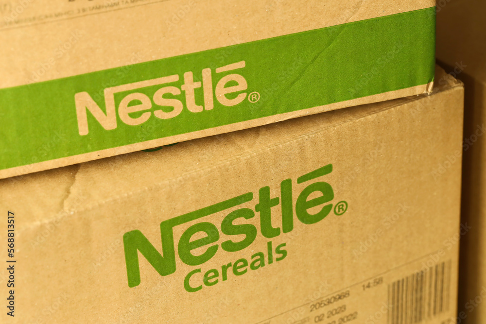KYIV, UKRAINE - MAY 4, 2022 Big cardboard boxes with logo of Nestle ...