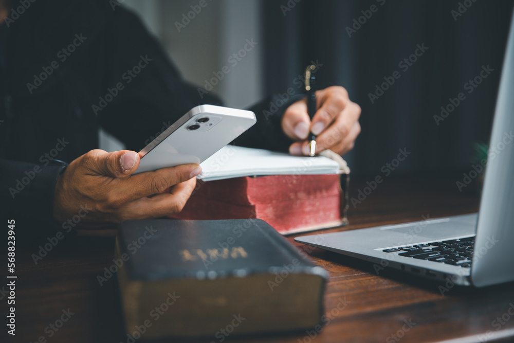 Christian online technology concept. Hands praying of christian with ...