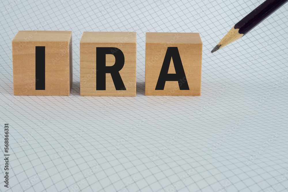 IRA on chart paper with hand holding pencil Stock Photo | Adobe Stock