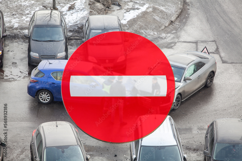 Sign entry is prohibited on the background of the accident of two cars ...