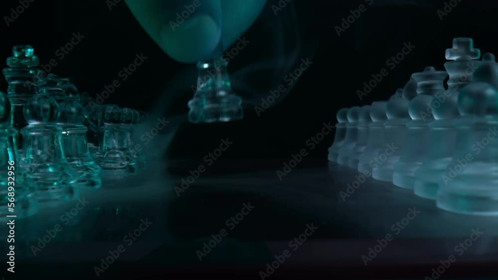 Vidéo Stock Glass chessboard on a black background. Figures are ...