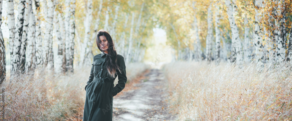 Sad beautiful girl with long natural black hair on bokeh background of ...