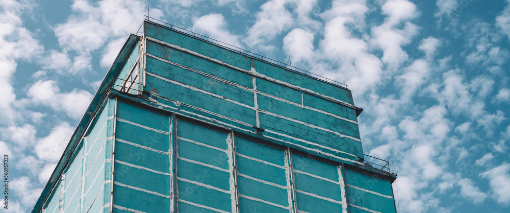 Giant wall of multistory production building. Picturesque old renovated ...