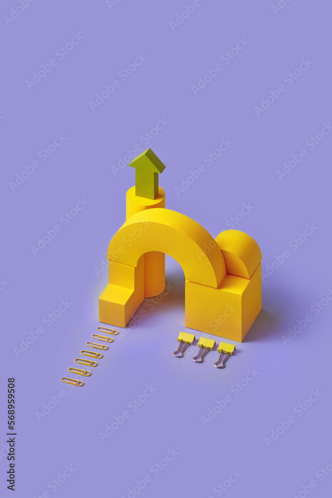 Yellow papercraft figures with office materials. Stock Photo | Adobe Stock