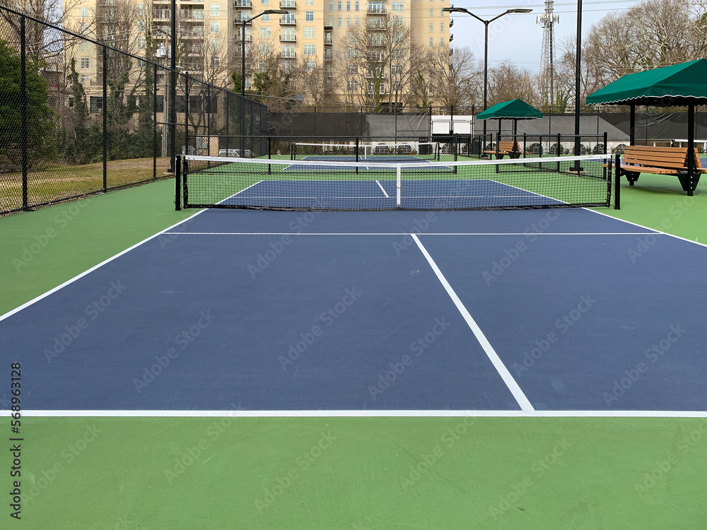 Outdoor permanent striped green and blue pickleball courts Stock Photo ...