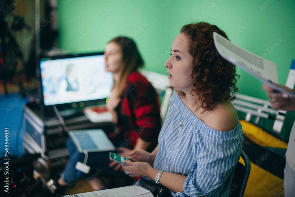 Director at work on the set. Shooting shift, equipment and group ...