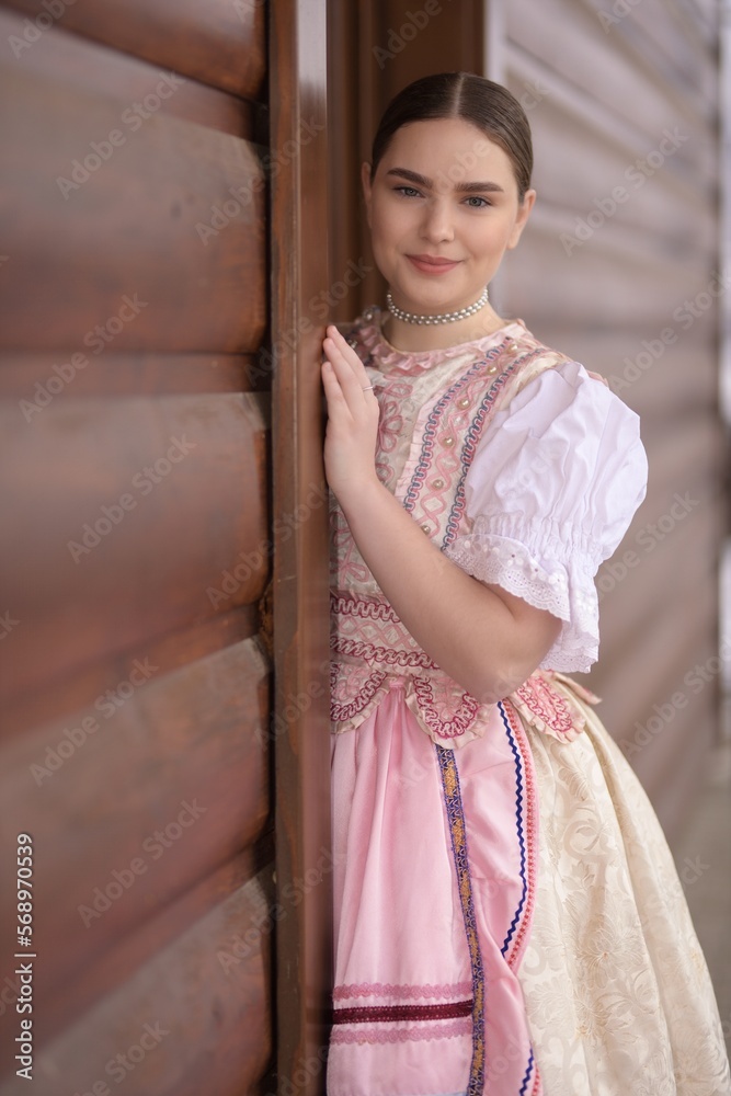 Young beautiful slovak woman in traditional dress. Slovak folklore ...