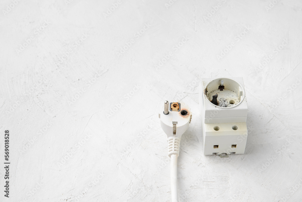 Electrical safety. An example of a short circuit in the network. Burnt ...