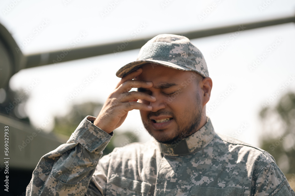 Foto Stock Stressed depressed crying lose war Asian man special forces ...