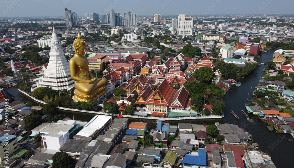 Aerial view of a big Buddha golden statue at Wat Paknam Phasi Charoen ...