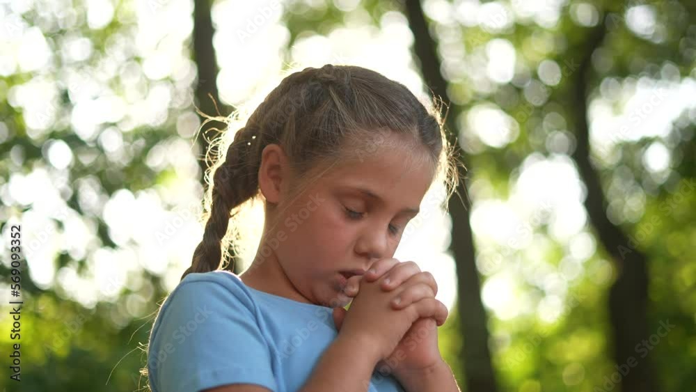 child pray. young gratitude a god religion concept. little girl in ...