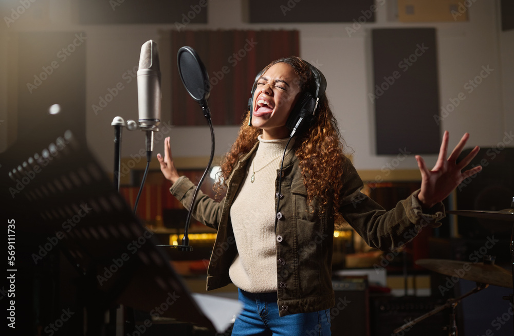 Music, streaming and woman recording in studio in home, singing into ...