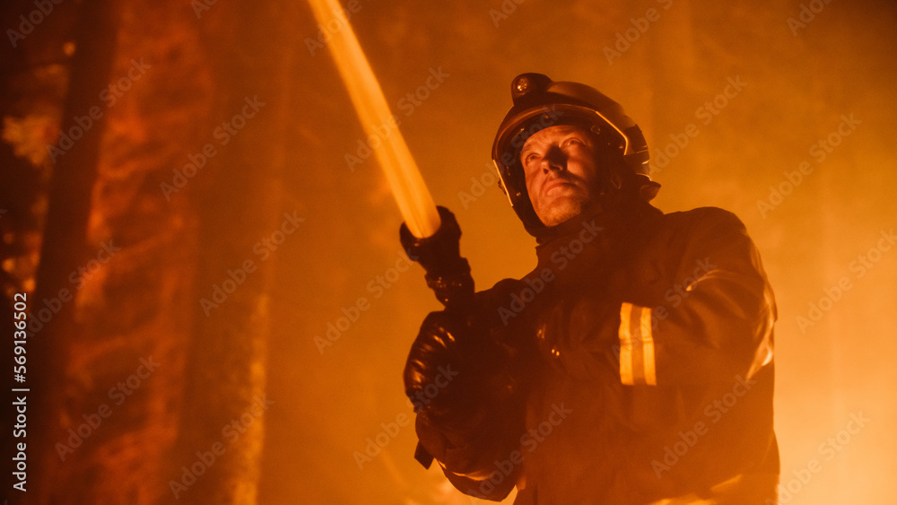 Experienced Firefighter Extinguishing a Wildland Brushfire Deep in the ...