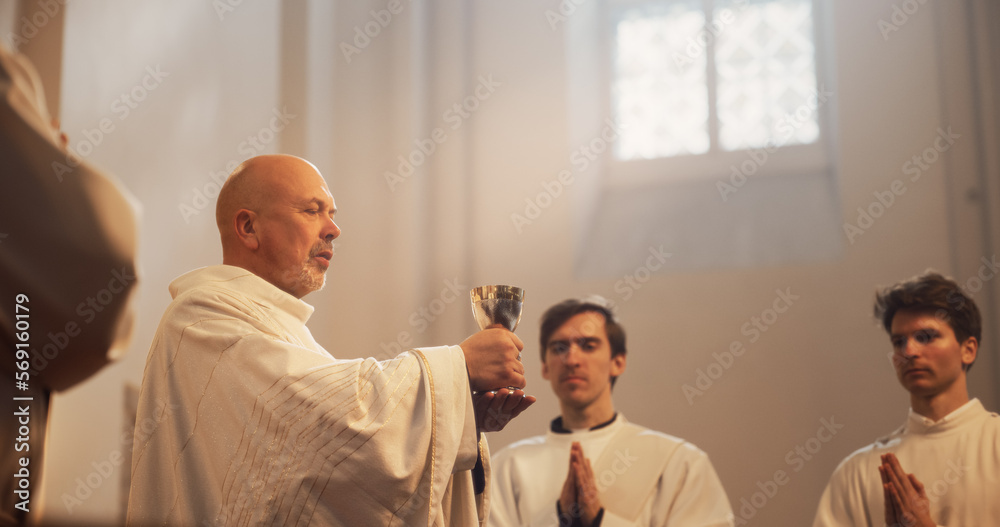 In Grand Old Church at the Altar Ministers Lead The Eucharist, Sacred ...