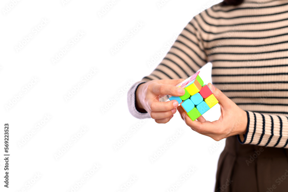 female hands holding a rubik cube standing on white background Stock ...