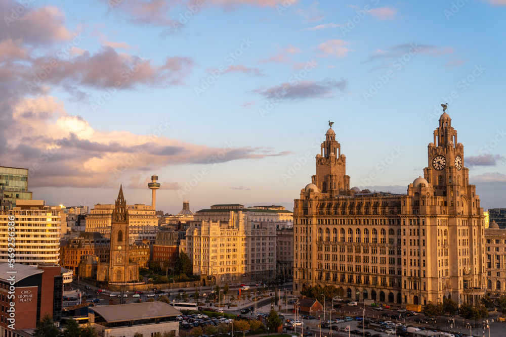 Liverpool, UK: Golden hour view of the Merseyside waterfront and city ...
