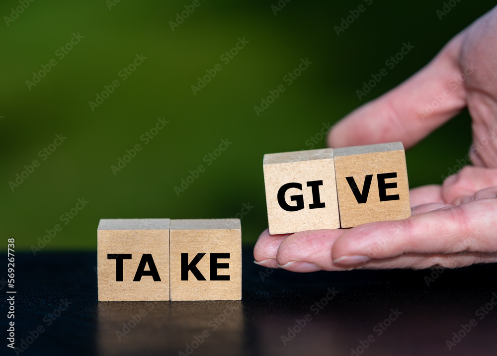 Cubes form the words give and take. Symbol for giving instead of taking ...