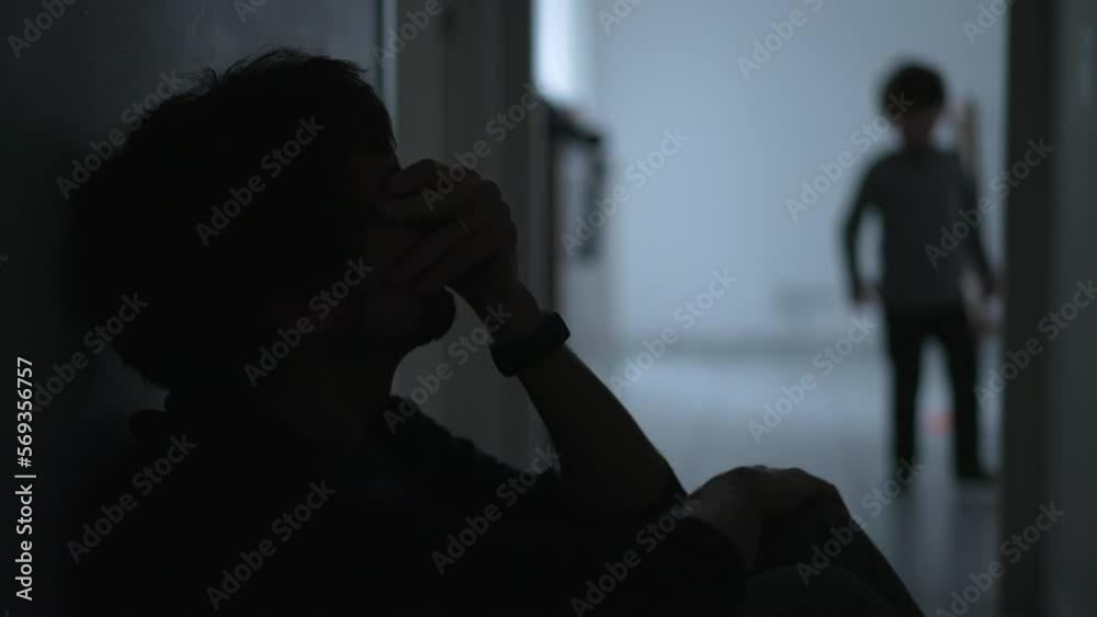 Son hugging father during crisis. Child consoling dad in difficult ...