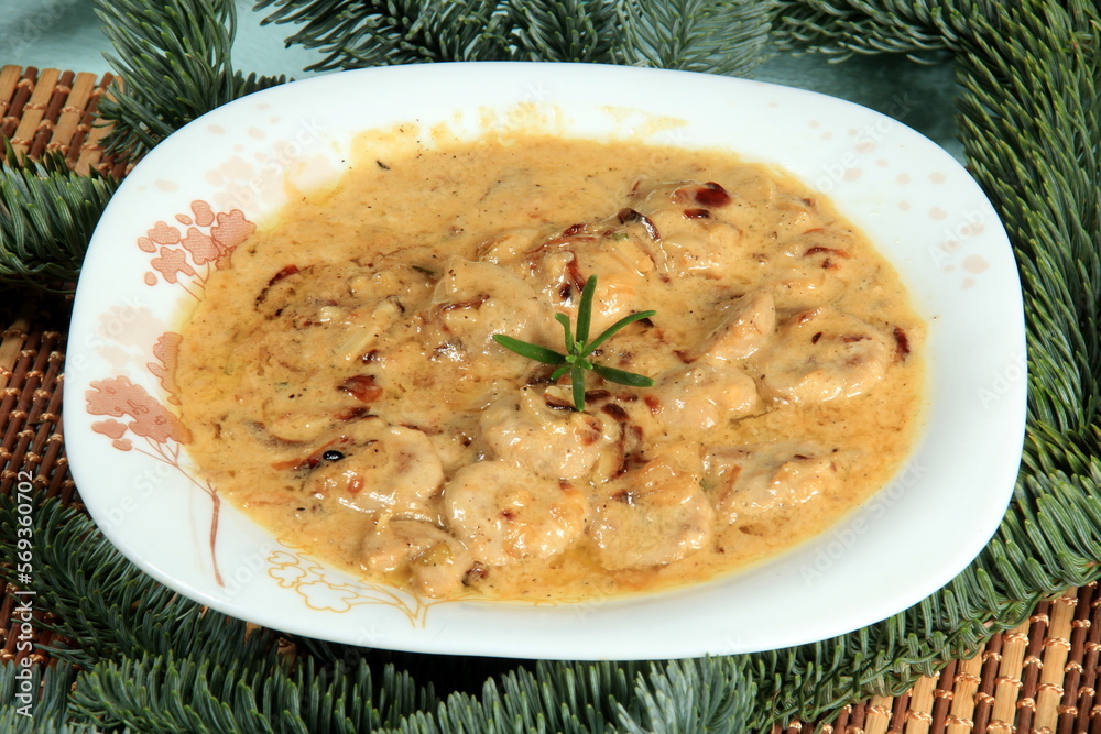fried testicles of bulls in butter, with cream sauce Stock Photo ...
