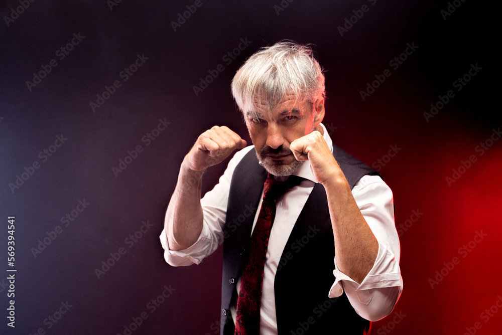Caucasian Business Man in waistcoat suit standing in a fight stance in ...