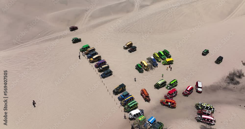 Dune buggies in Huacachina, Peru desert. Fast sand buggy driving on the ...