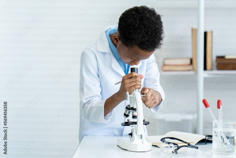school children in science classroom, doing chemistry science ...
