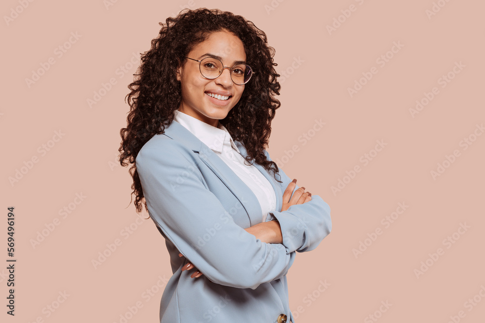 Young smiling successful mixed race woman entrepreneur or an office ...
