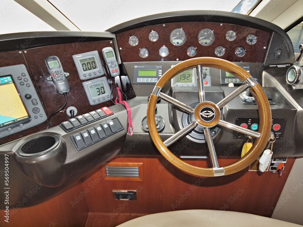 Cockpit and dashboard of a modern motor yacht ภาพถ่ายสต็อก | Adobe Stock