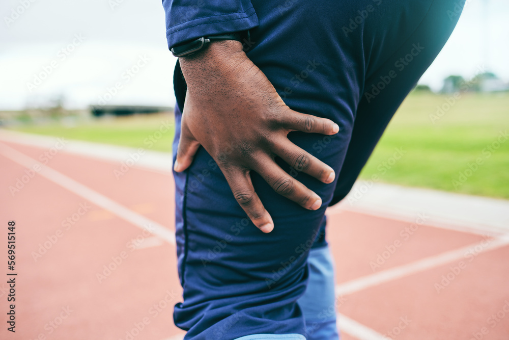 Leg pain, injury and black man runner, fitness and race in stadium ...