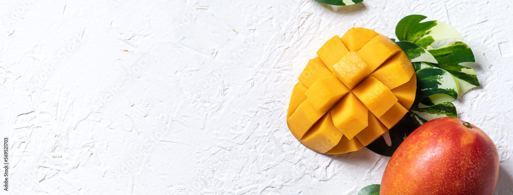 Mango background design concept. Top view Diced fresh mango fruit on ...